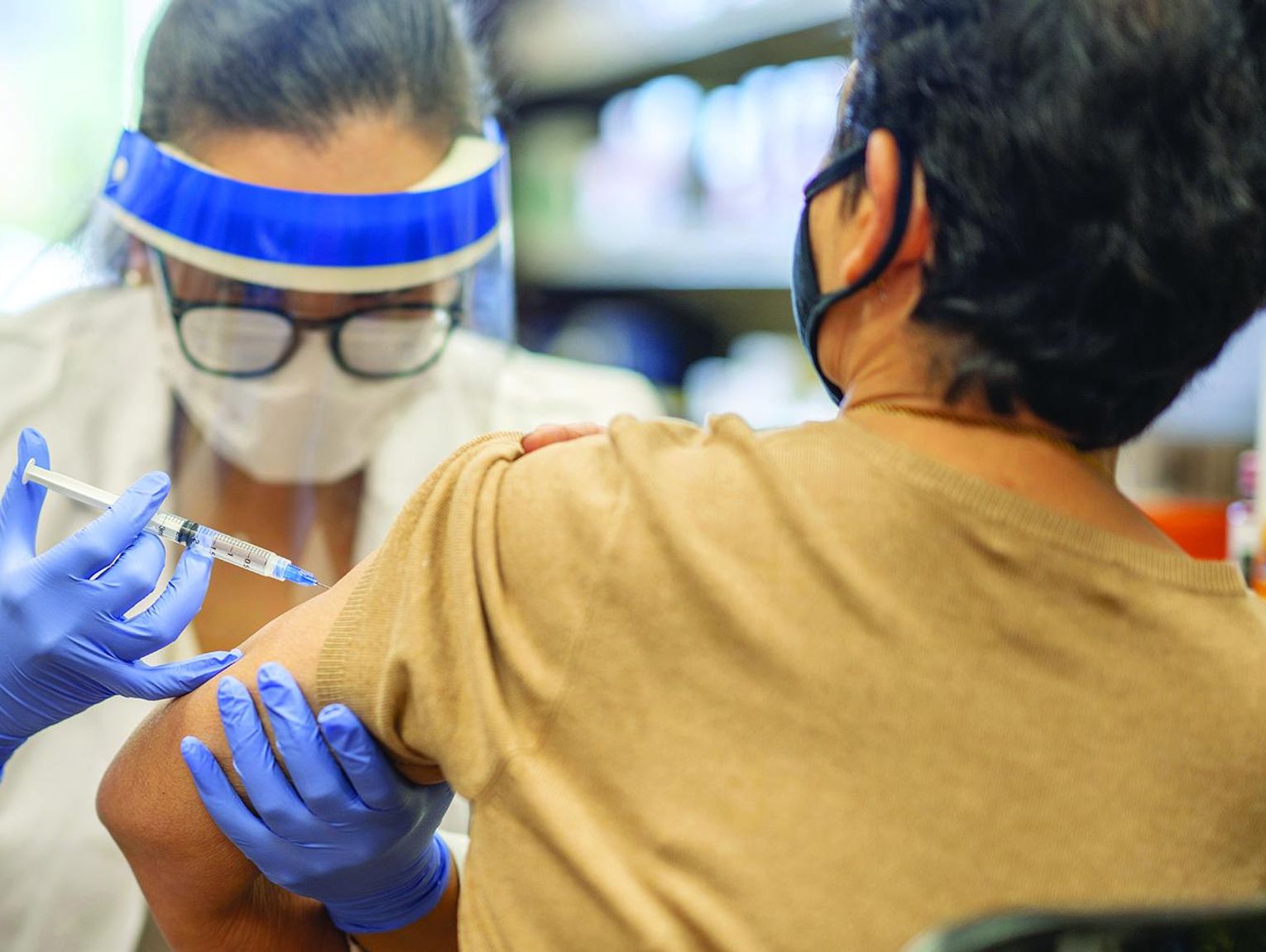 After pandemic year, weary world looks back — and forward