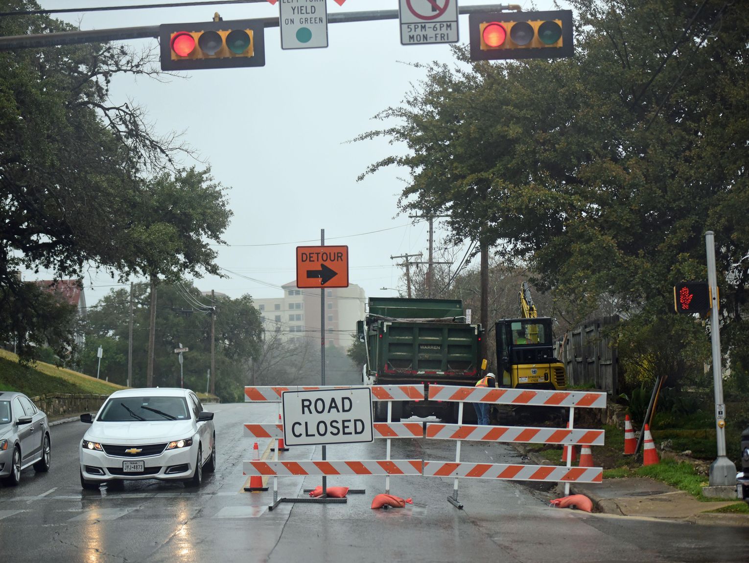 Sidewalk construction closes roadway